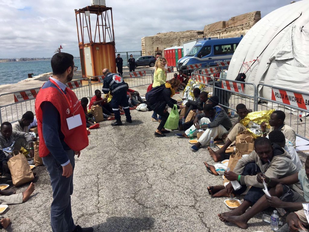 Migrants burn mattresses and try to flee repatriation center in Italy ...