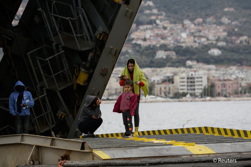 Migrants stranded at Lesbos harbor transferred to Greek navy ship ...