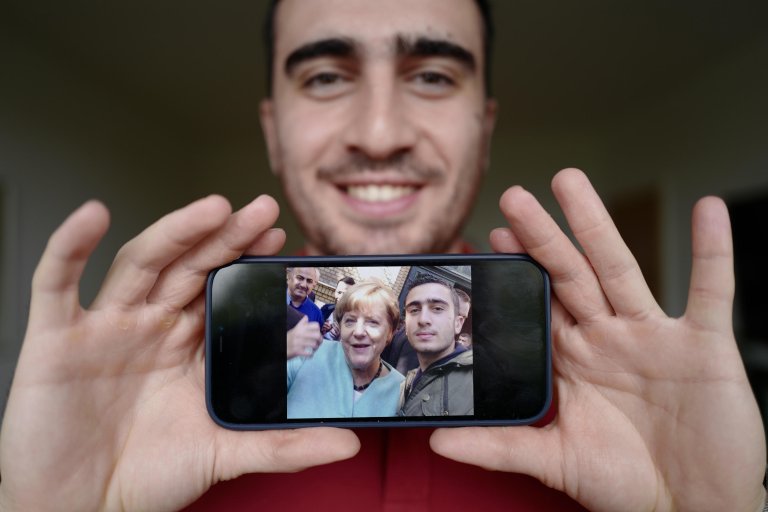 10 years after, Syrian refugee who took selfie with Merkel speaks ...